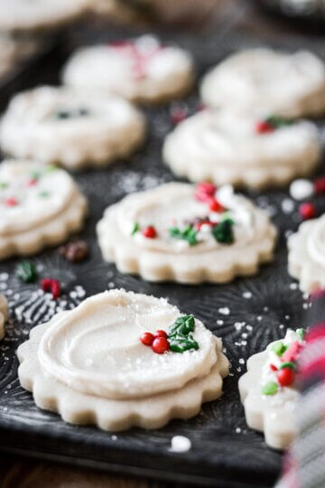 Frosted Cutout Christmas Cookies with Sprinkles - Curly Girl Kitchen