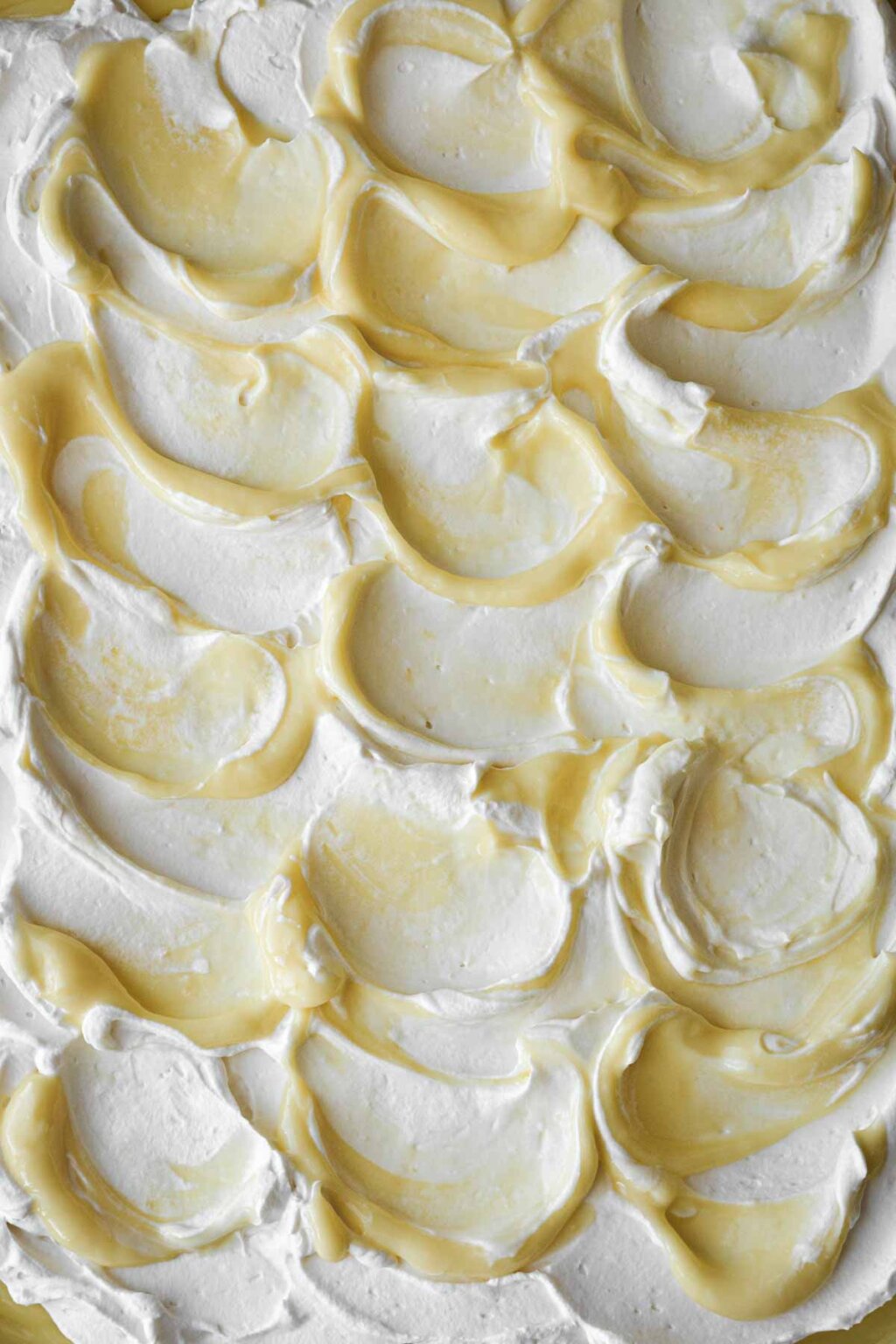 High Altitude Lemon Pudding Poke Cake - Curly Girl Kitchen